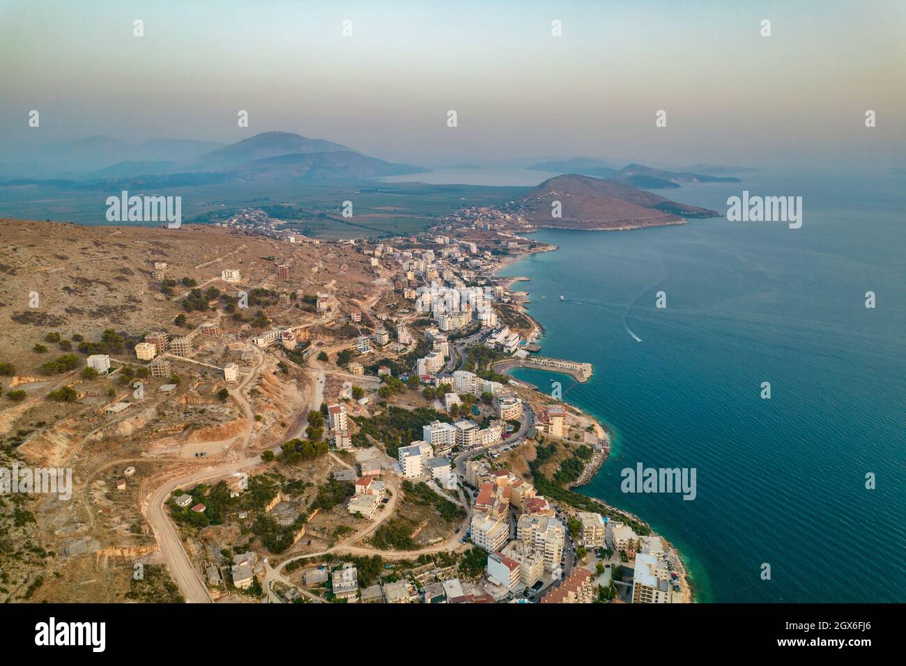 Aerial sunset drone view of Saranda city and port in Albania Stock ...