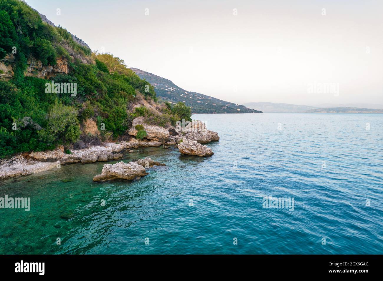 Aerial drone view over rocky coast in Mparmpati, east of Corfu island ...