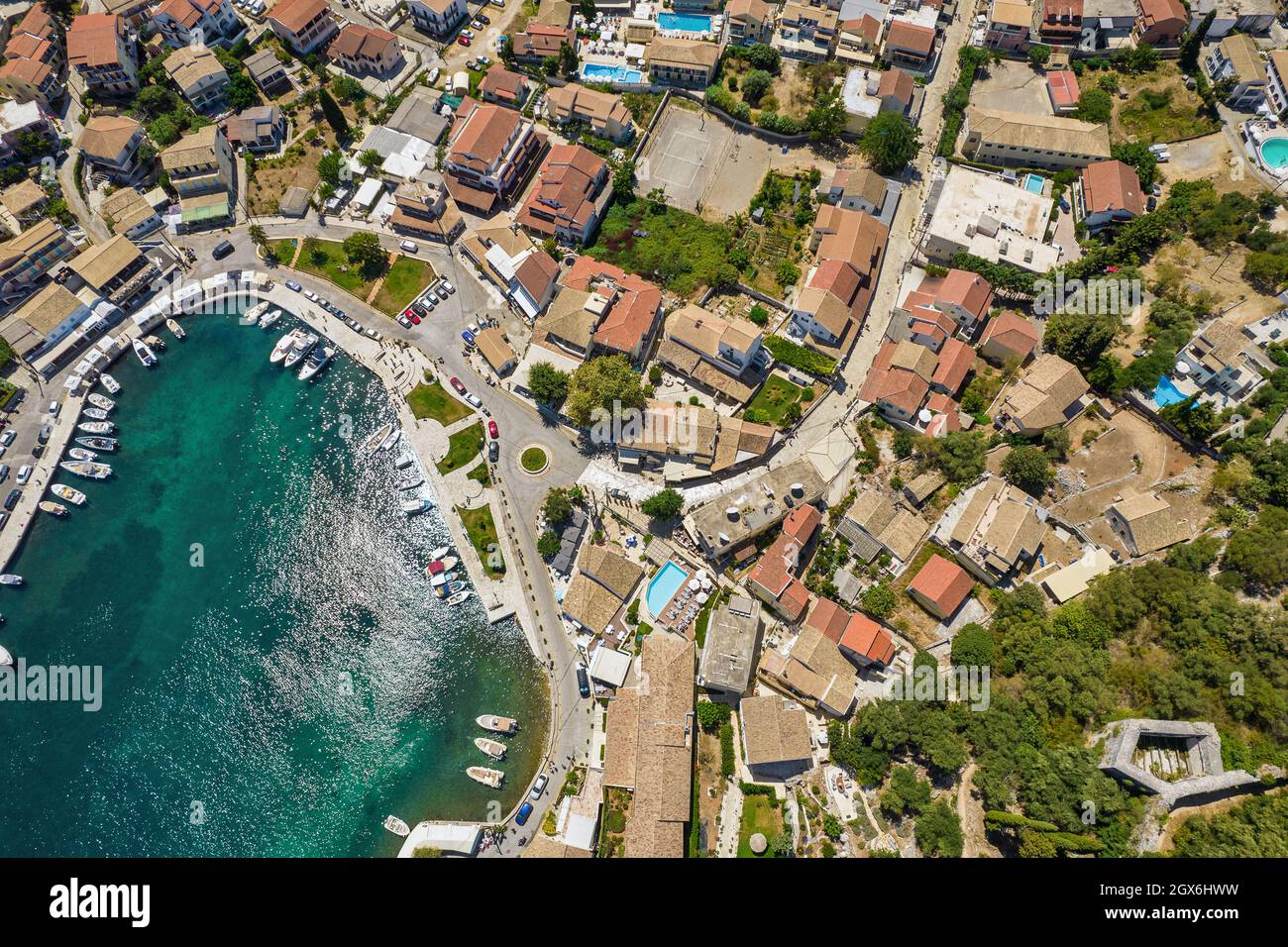 Aerial drone view over Kassiopi marina, iconic small port and fishing ...
