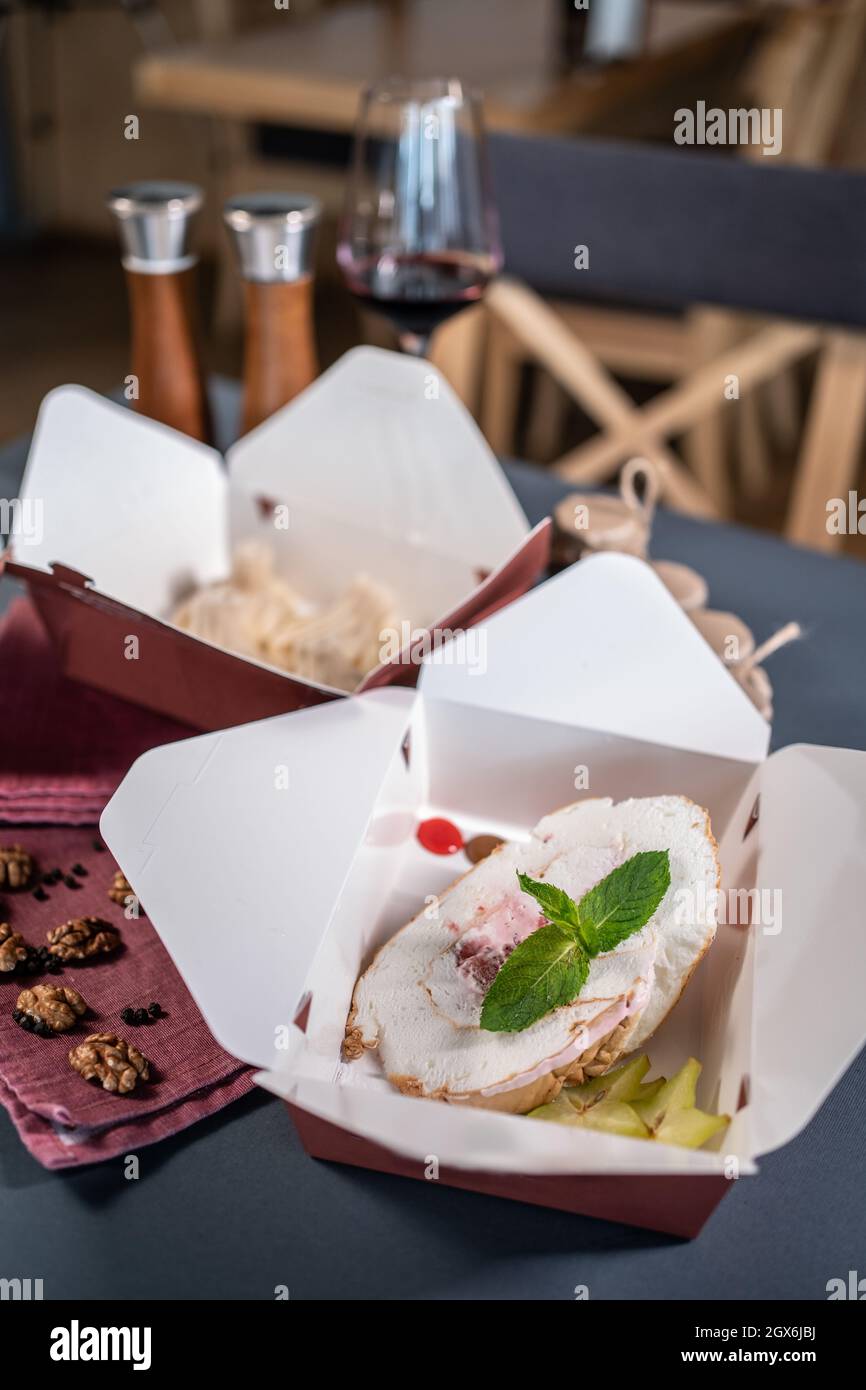 delivery food or kraft paper containers with meal or cake dessert in ...