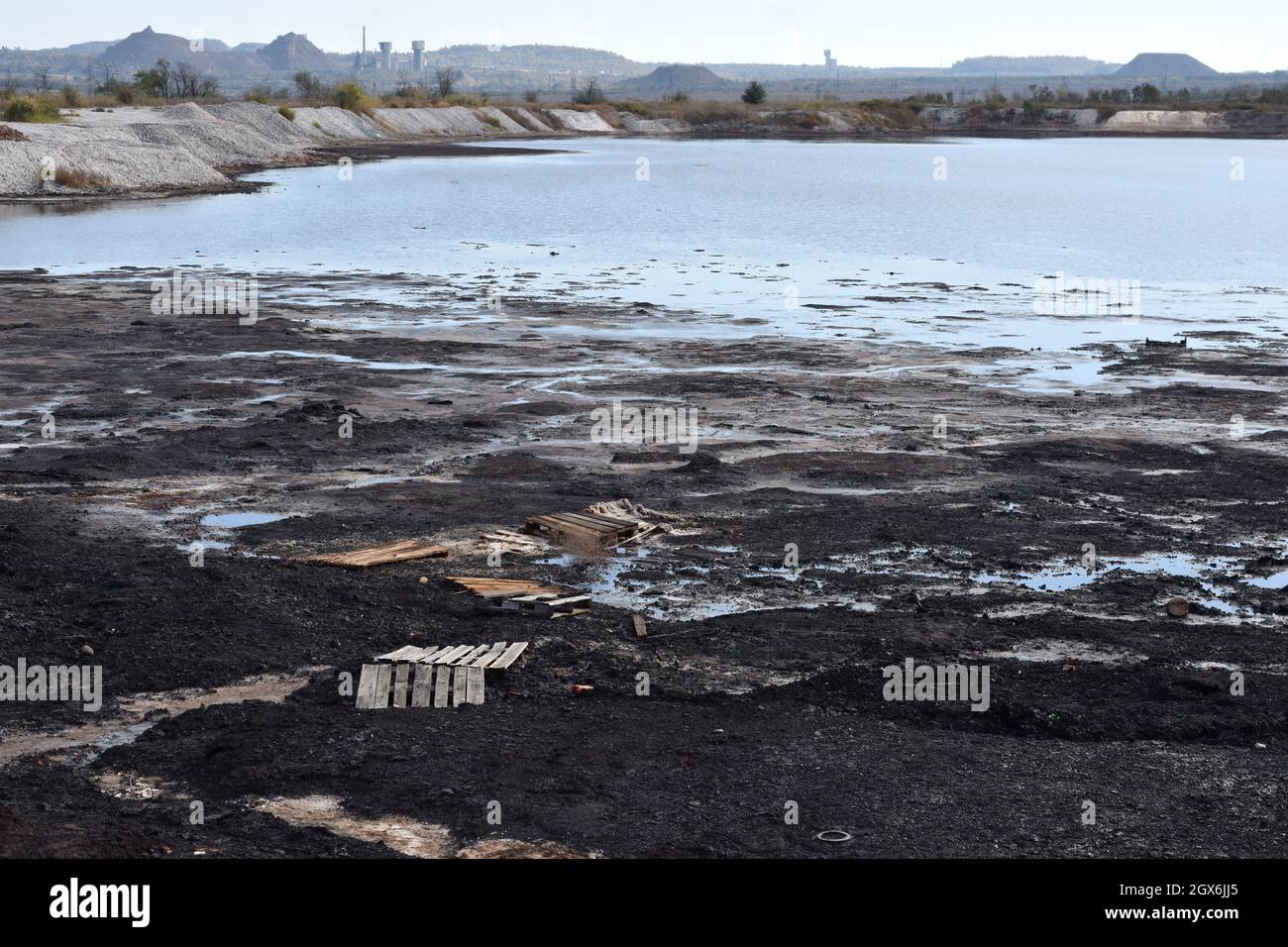 One of three slime-pits of the local phenol manufacturing plant is seen ...