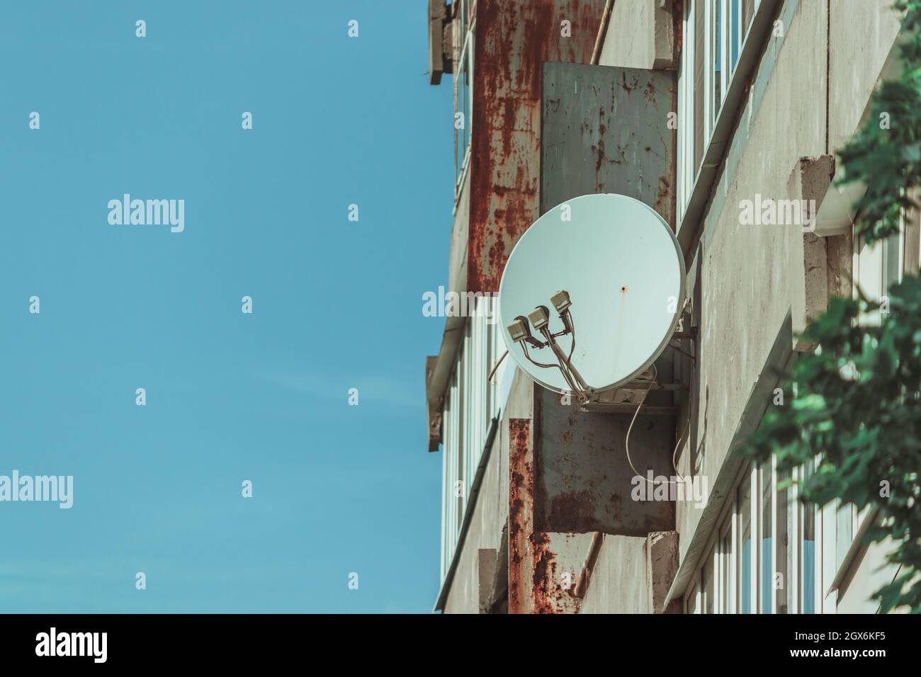 Old rusty panel house with a white satellite dish for television Stock ...