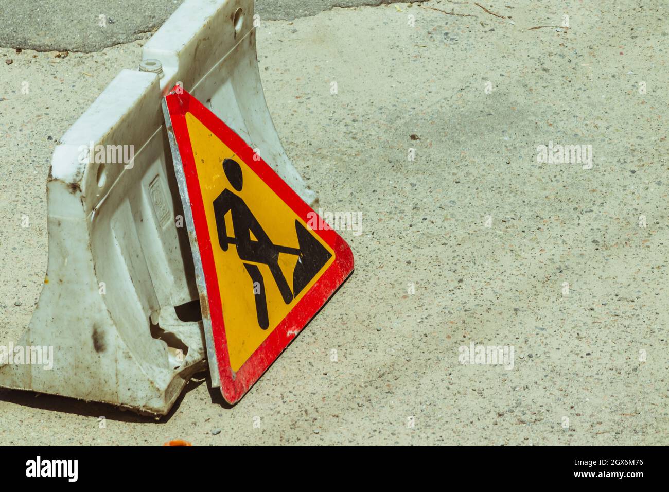 An old road sign that prohibits passage due to road repair work Stock ...