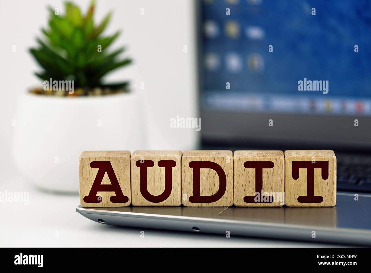 audit theme. wooden cubes with the word audit, on the background of ...