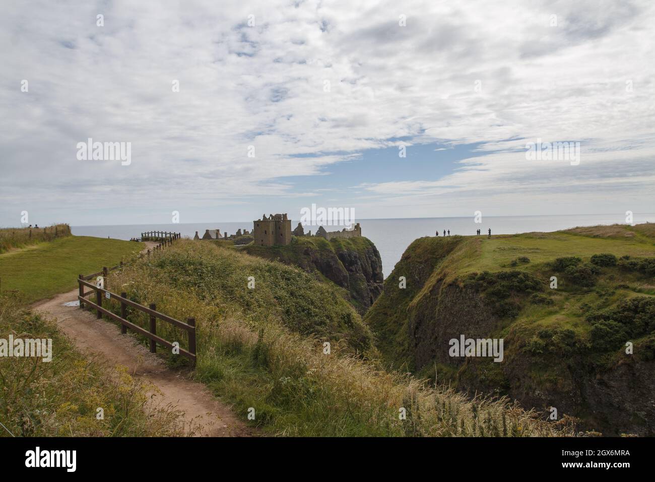 Historic ruined medieval fortress of Dunnottar Castle on the top of a ...