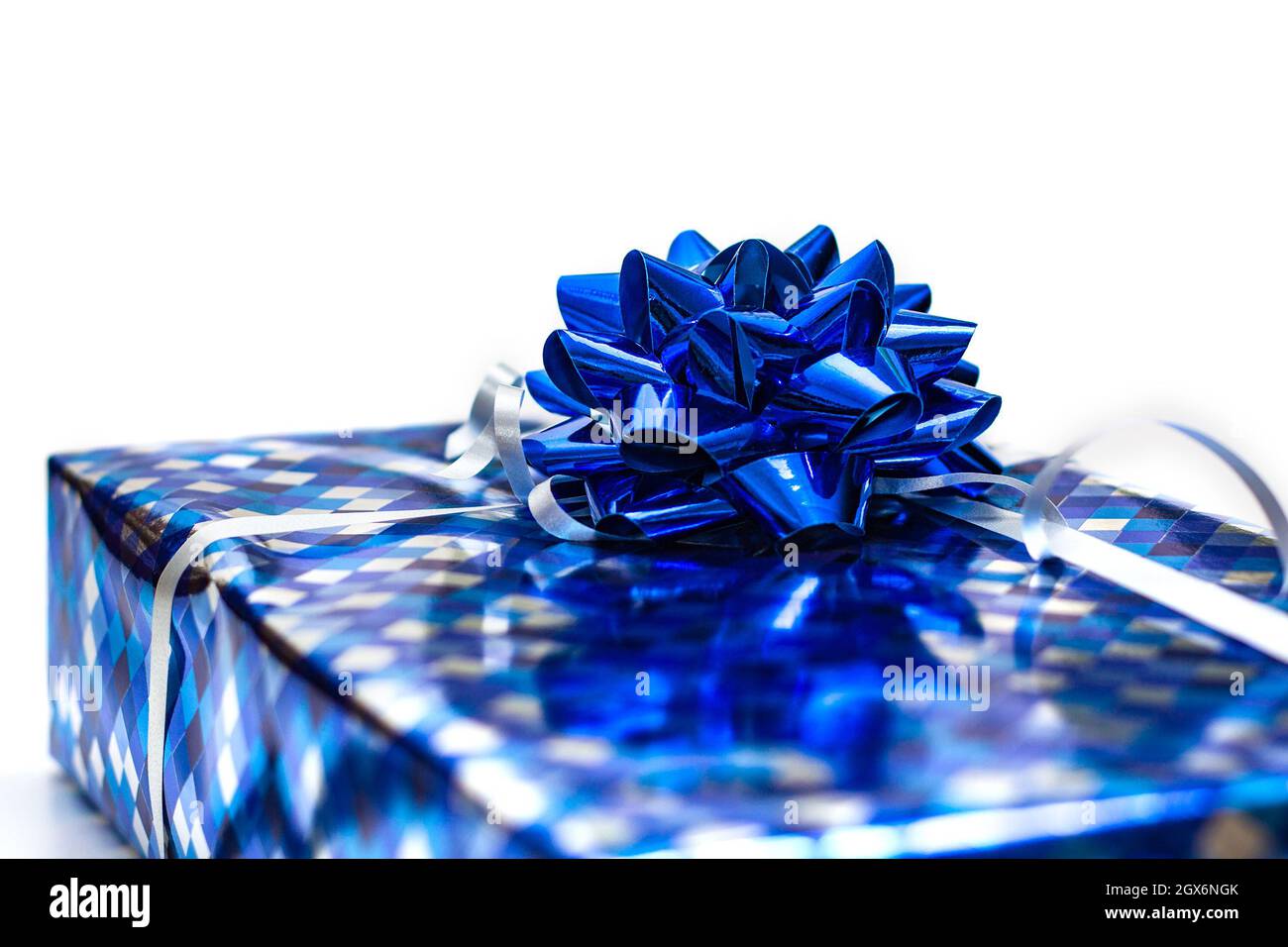 blue gift box with ribbon, gift wrapping Stock Photo - Alamy