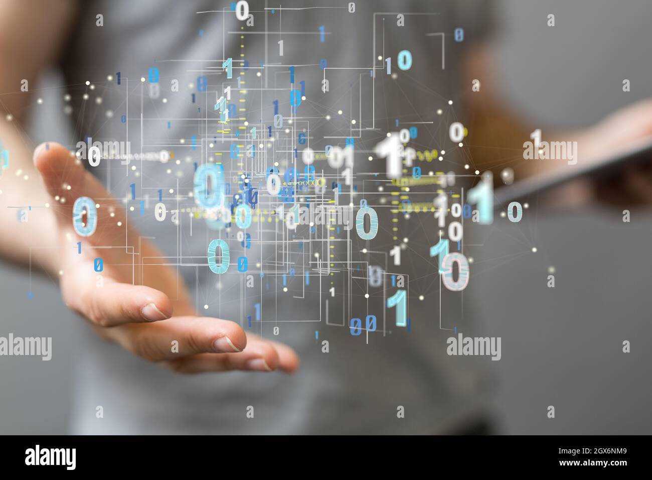 Hologram of binary codes on the palm of a businessman - digital ...