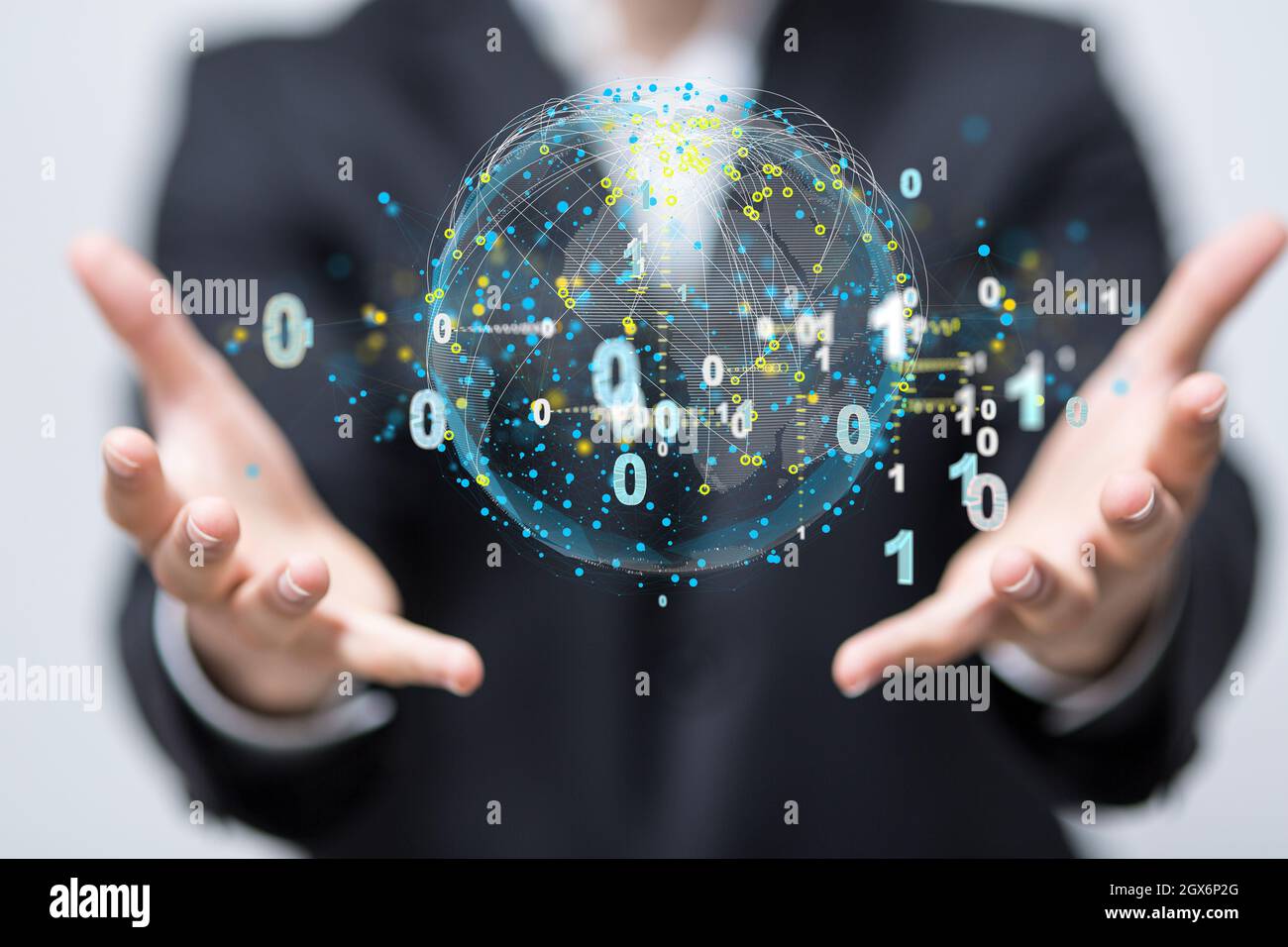 Hologram of binary codes around a globe between the palms of a ...