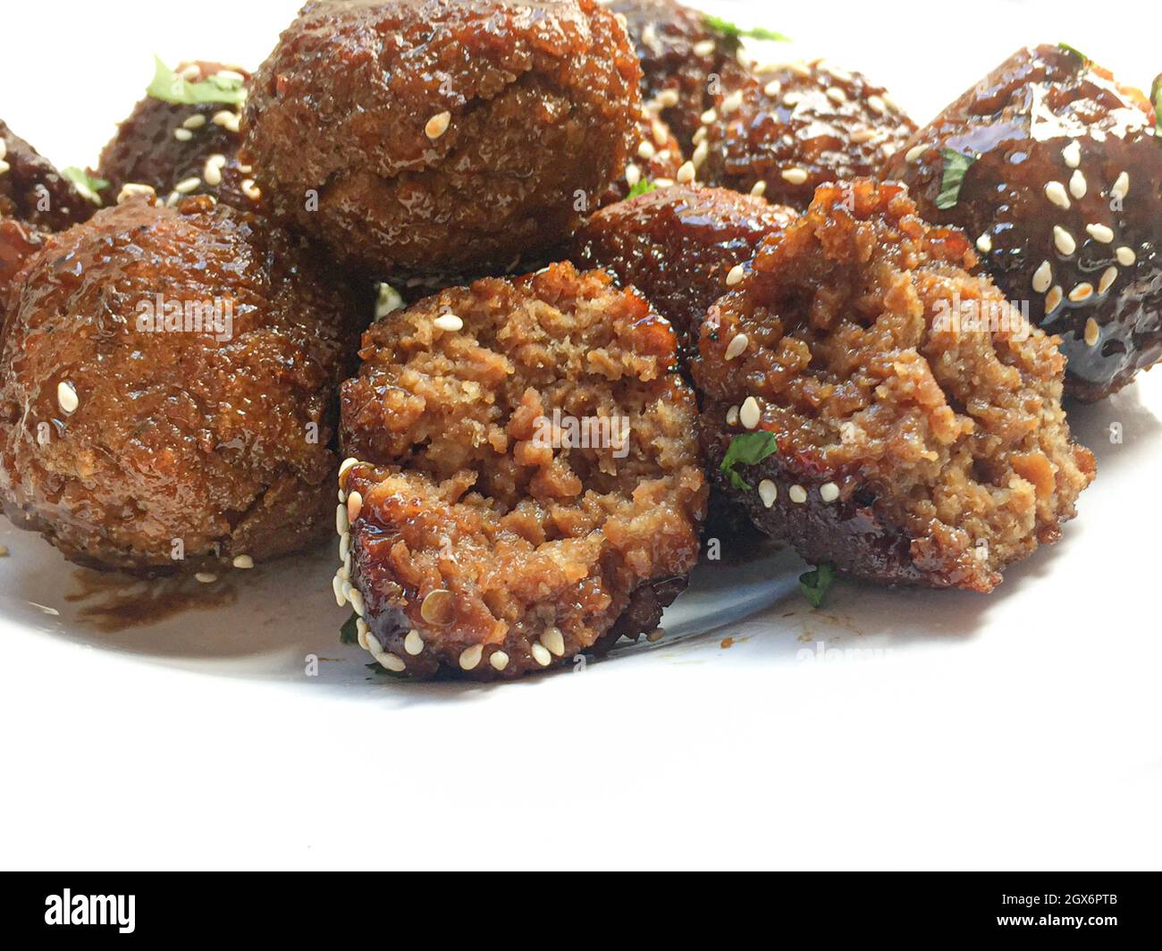 Seitan vegan meatballs tsukune style with tare sauce Stock Photo - Alamy