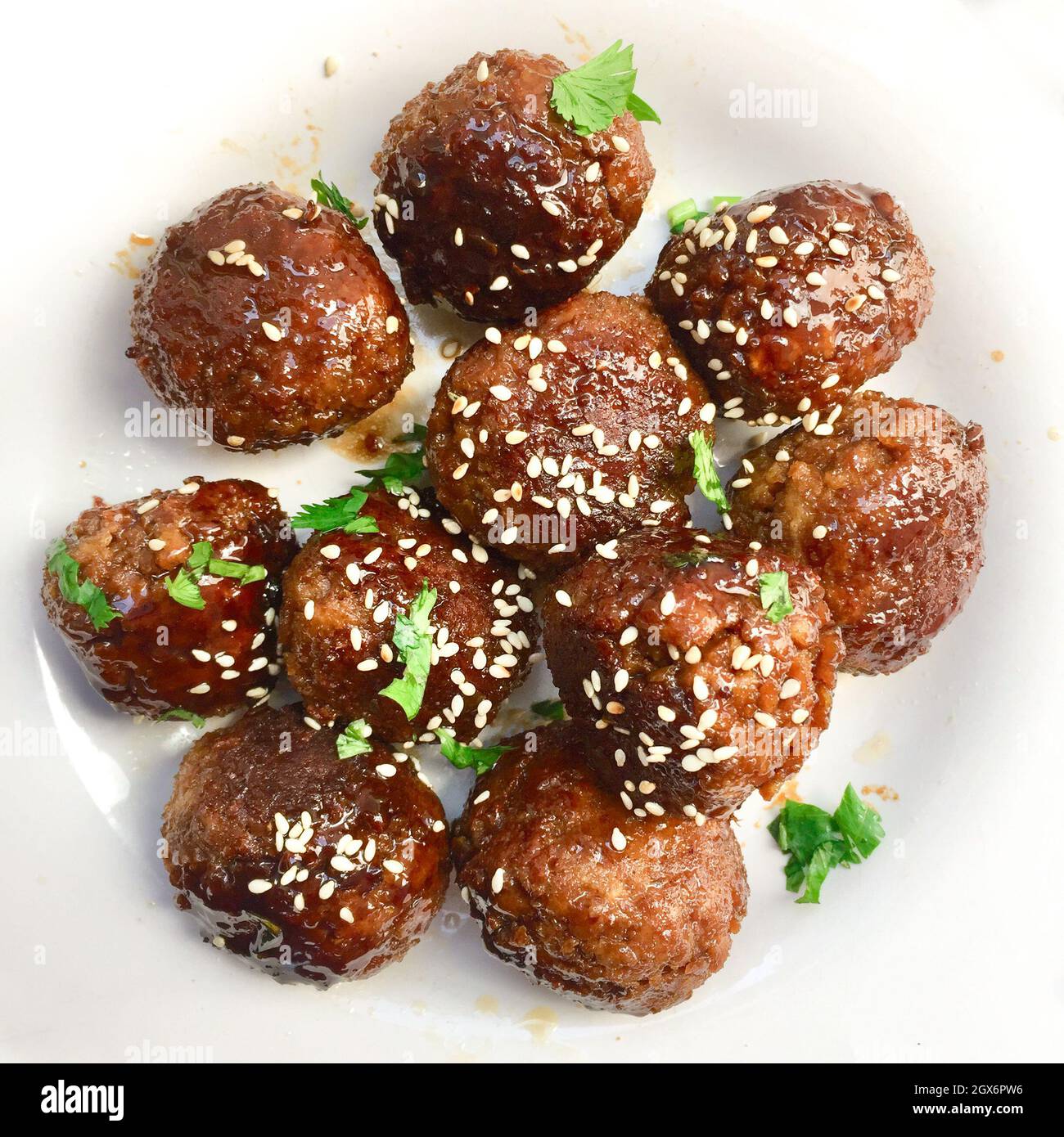 Seitan vegan meatballs tsukune style with tare sauce Stock Photo - Alamy