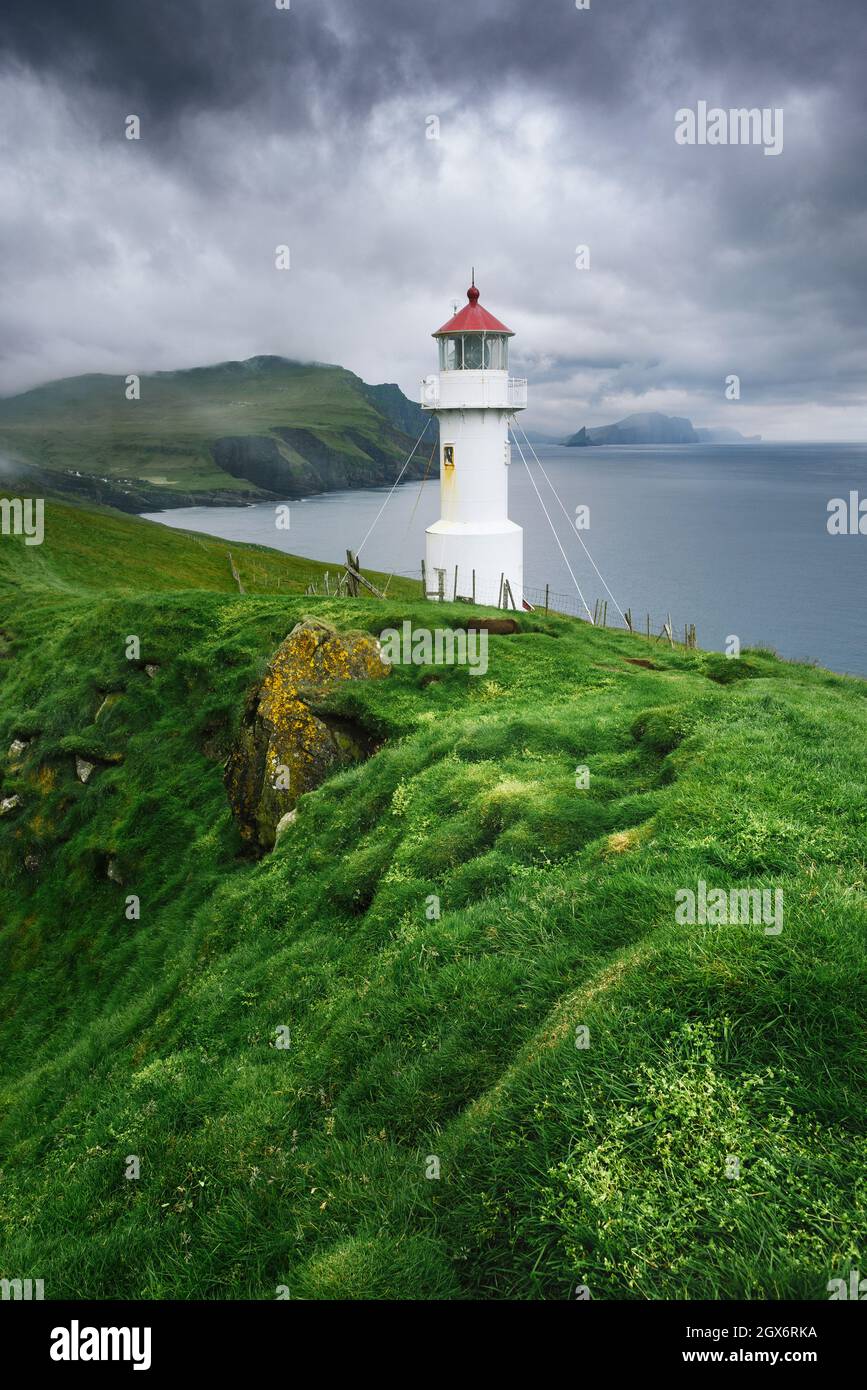 landscape with Mykines Holmur Lighthouse on Faroe Islands, Denmark ...