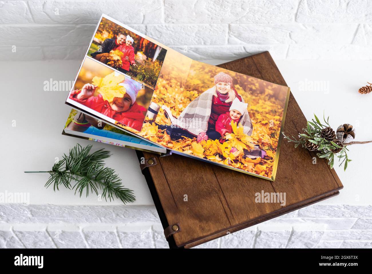 photo book with wooden cover. unfolded photobook. sample photobook ...