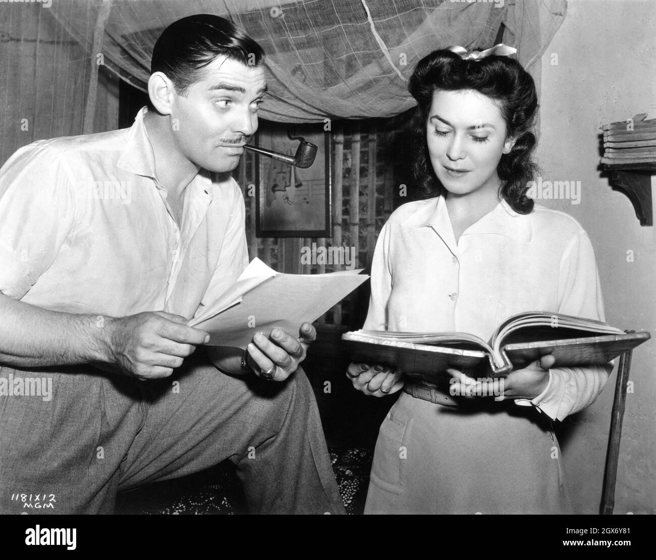 CLARK GABLE on set candid rehearsing his lines with Script Secretary ...