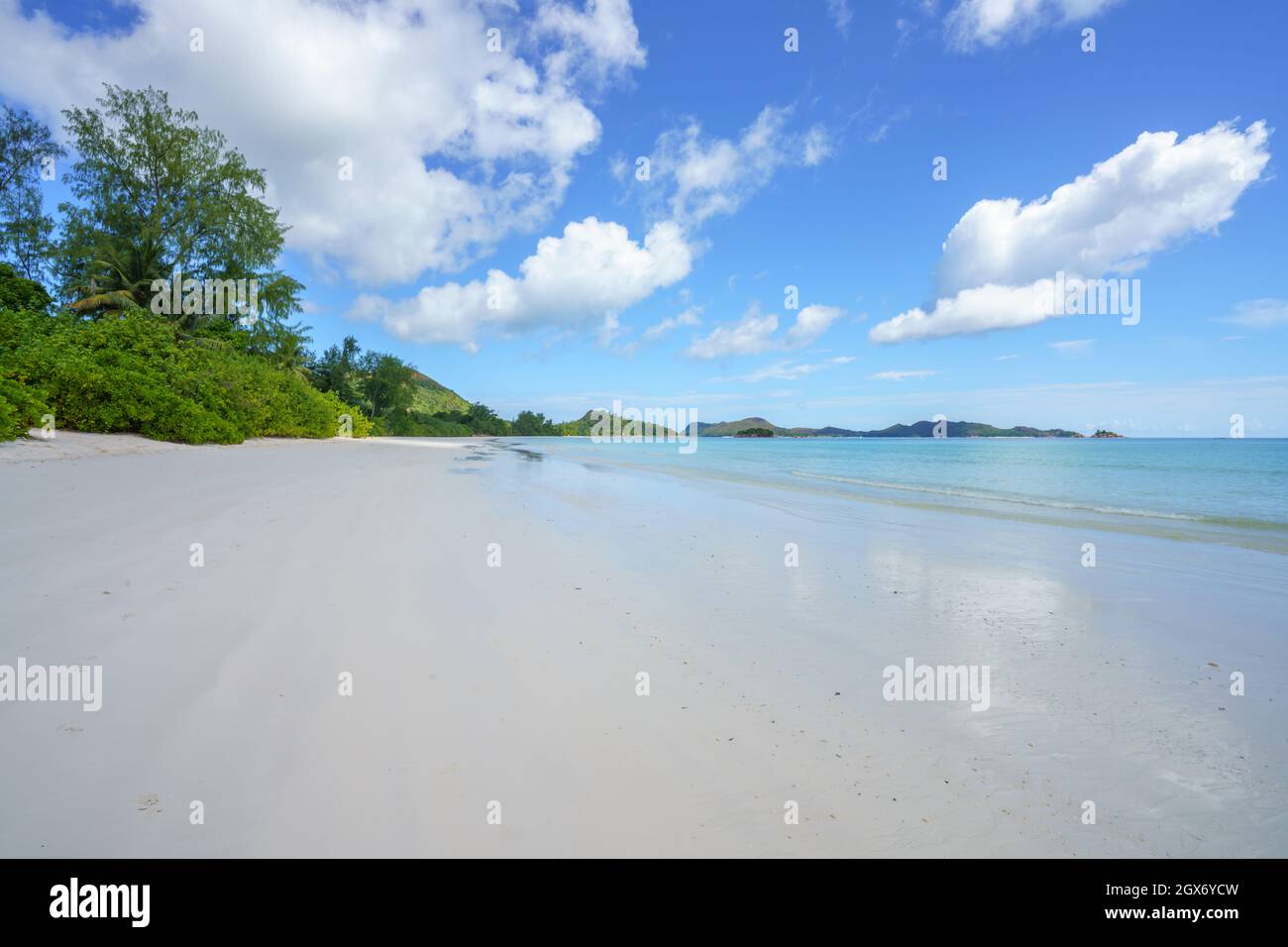 tropical beach at anse volbert on praslin on the seychelles Stock Photo ...