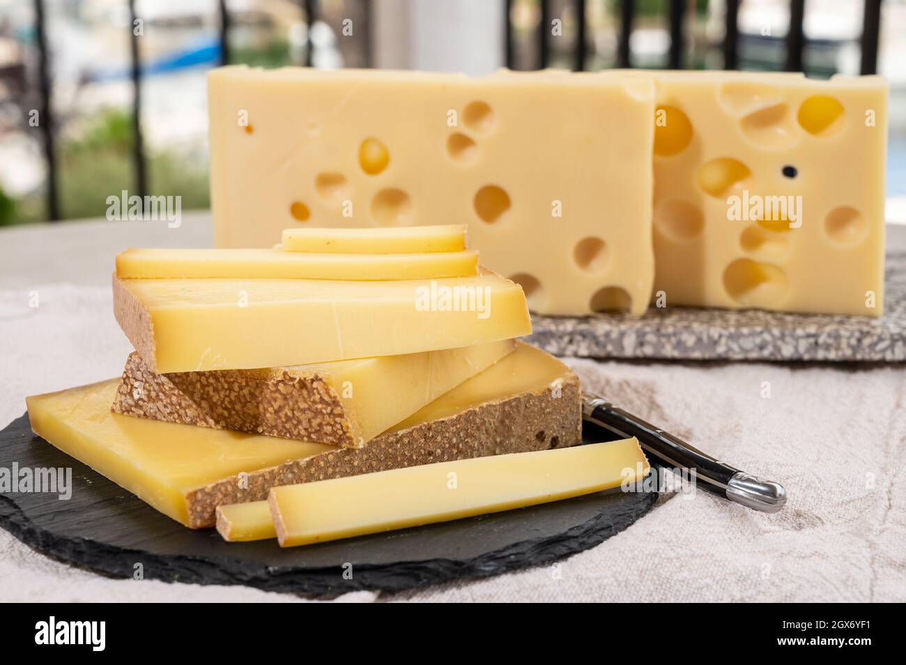Cheese collection, hard French cheeses comte and emmentaler with round ...