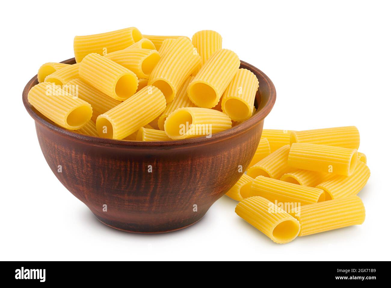 raw italian Rigatoni pasta in ceramic bowl isolated on white background ...