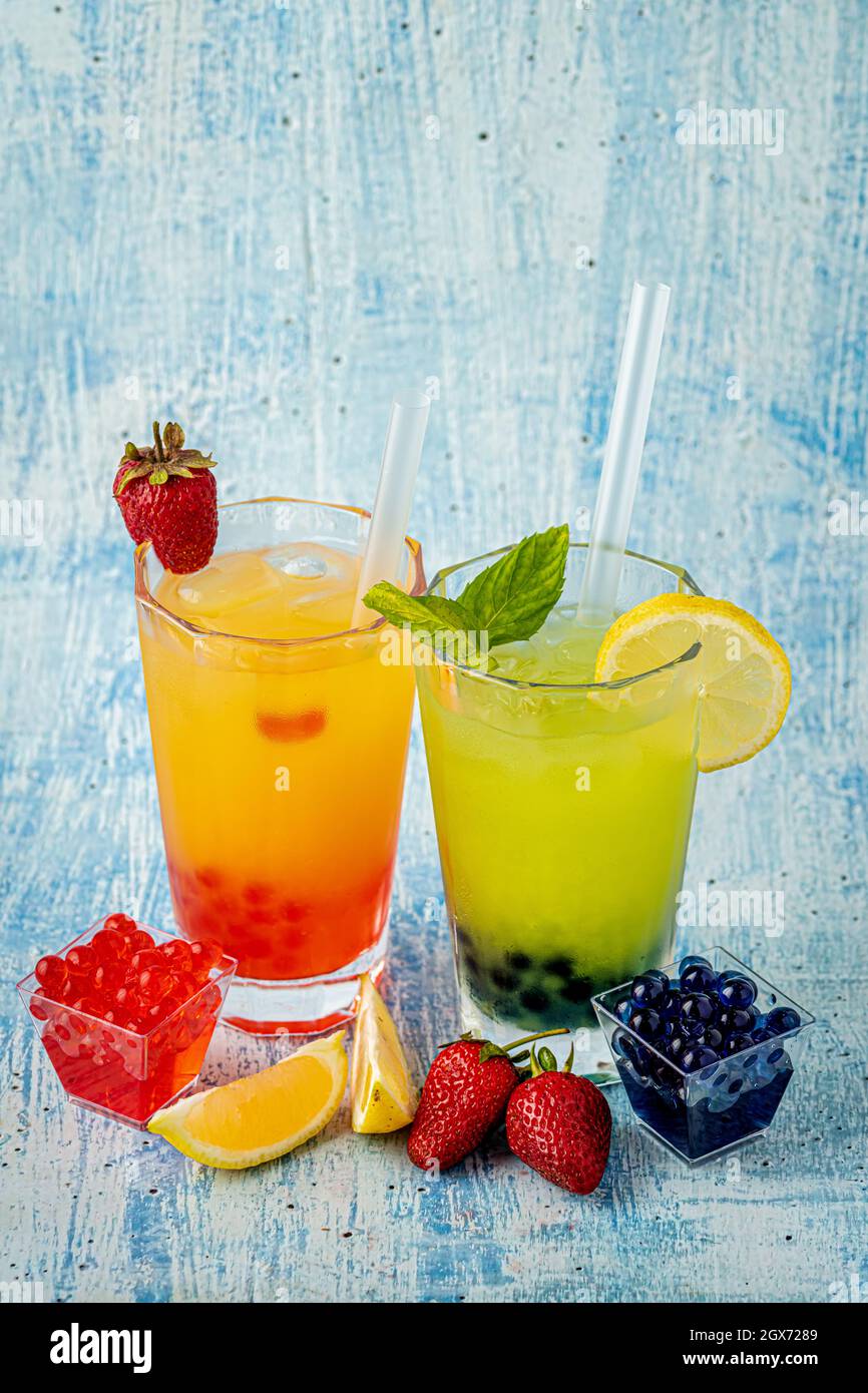 Lemonade with bubble tea on blue stone background Stock Photo - Alamy