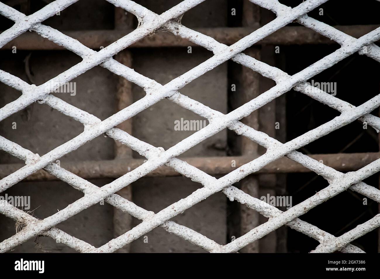 Old metal grate in basement of abandoned building. Texture of the iron ...