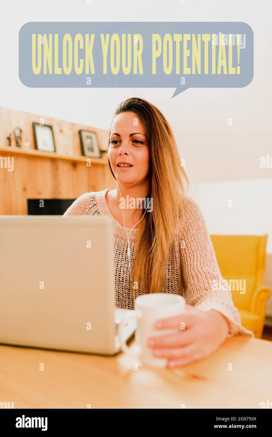 Hand writing sign Unlock Your Potential. Word Written on release ...