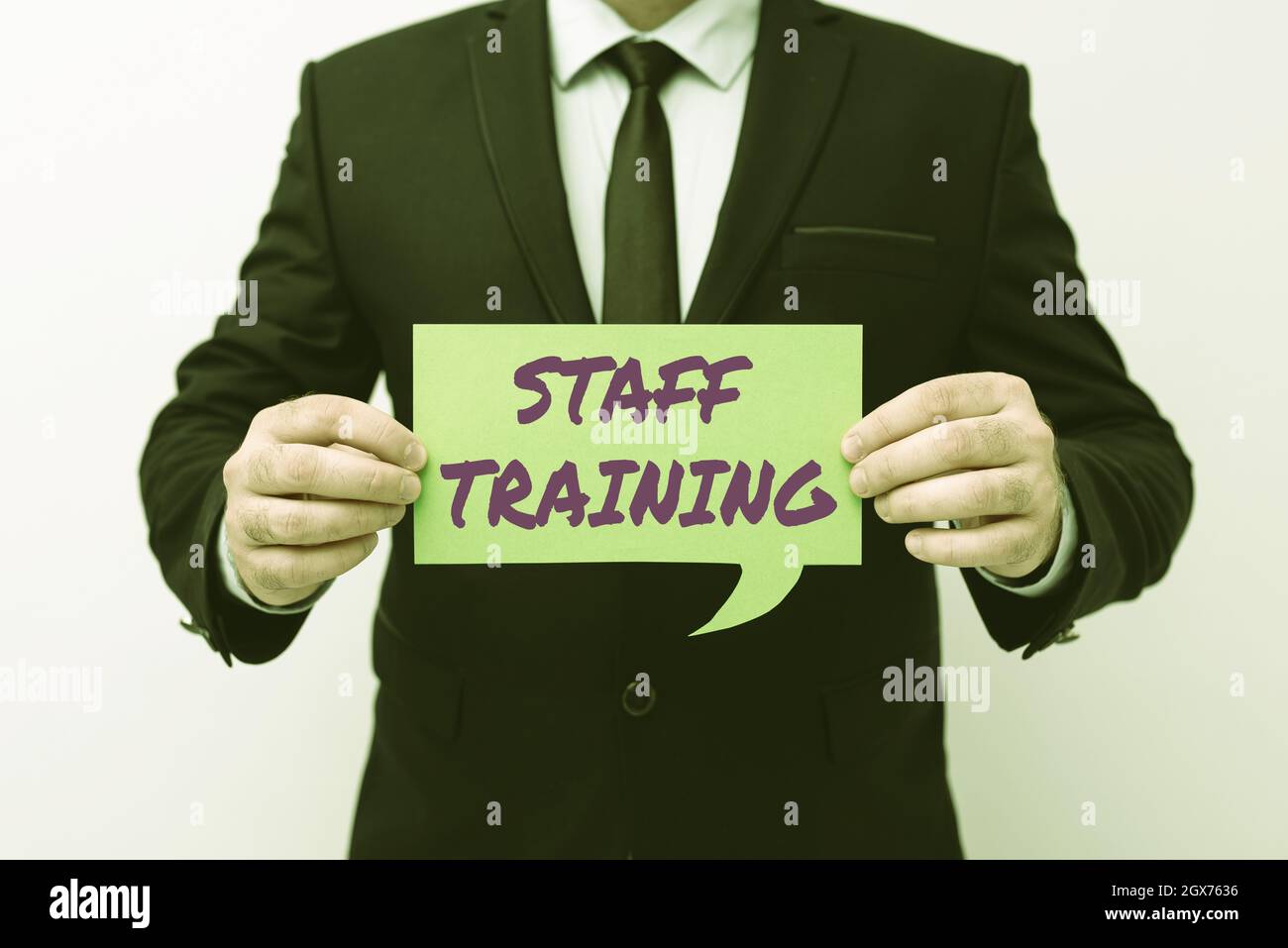 Hand writing sign Staff Training. Business showcase A program that ...