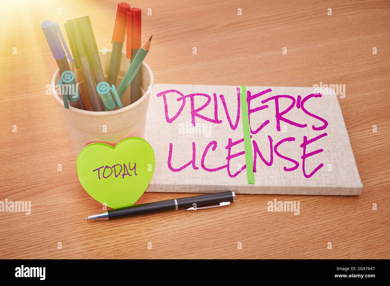 Sign displaying Driver S License. Word Written on a document permitting ...