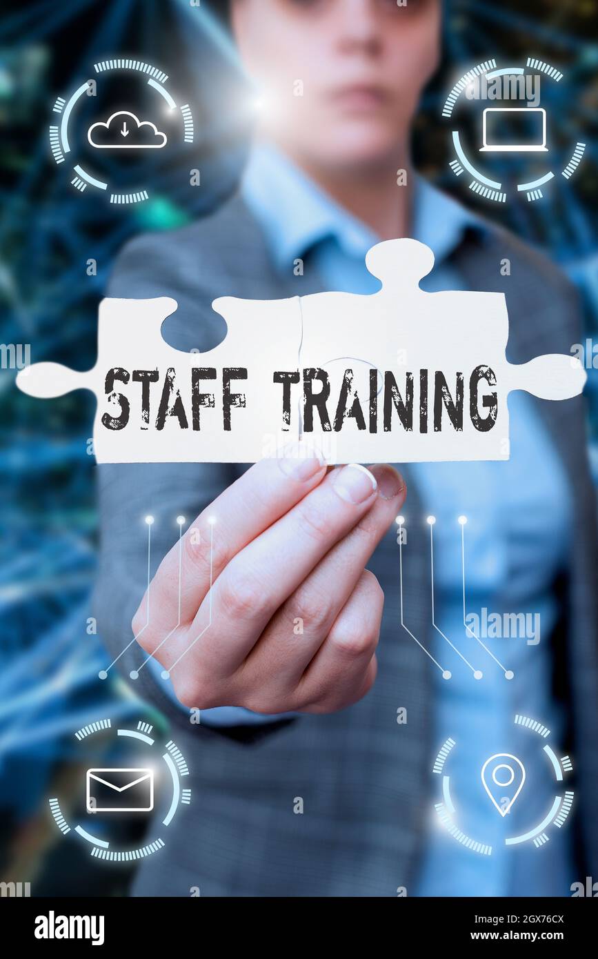 Text caption presenting Staff Training. Word Written on A program that ...