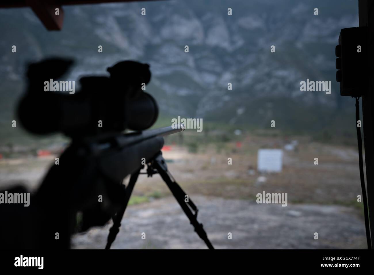 Shooting long range on the mountain side Stock Photo - Alamy