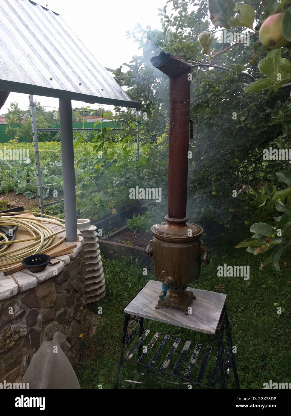 The view of traditional russian samovar with steam coming out. Picnic ...