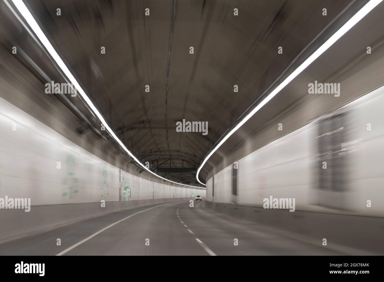 modern underground tunnel with gray road tunnel of motion car ...