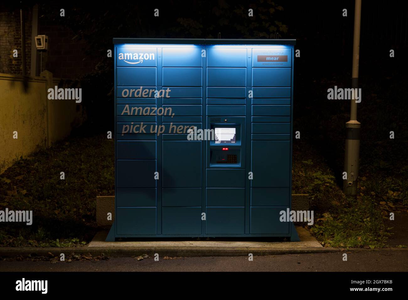 Amazon Hub Locker seen at night in the car park of Kenley Train Station ...