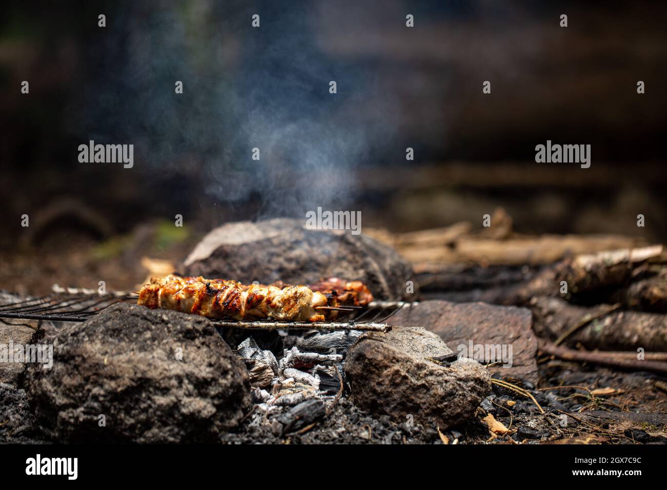 Meat cooking on a barbeque grill Stock Photo - Alamy