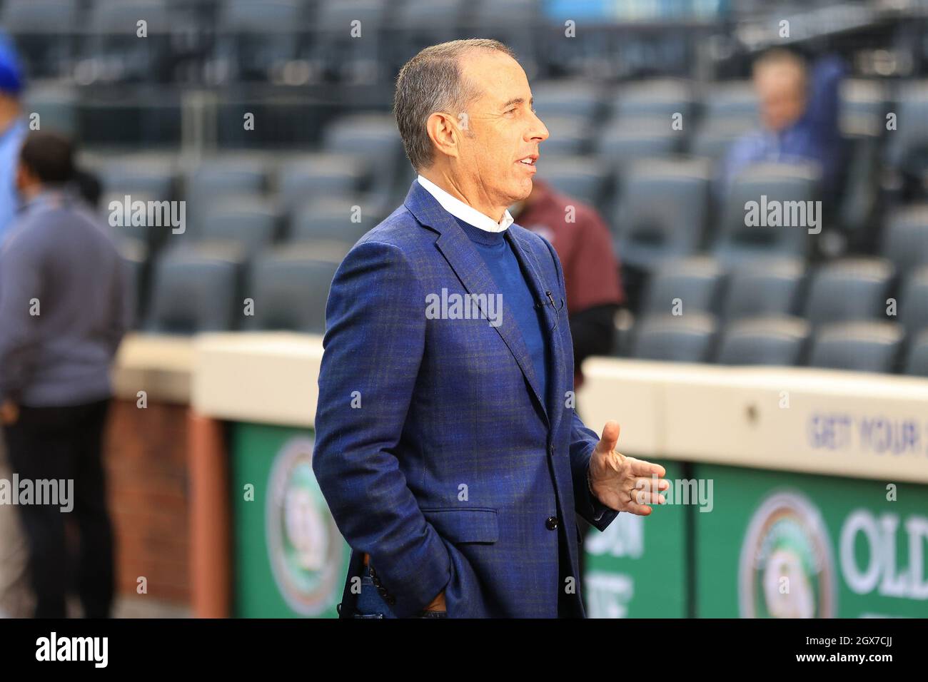 Comedian Jerry Seinfeld does a promo on the field before the baseball ...