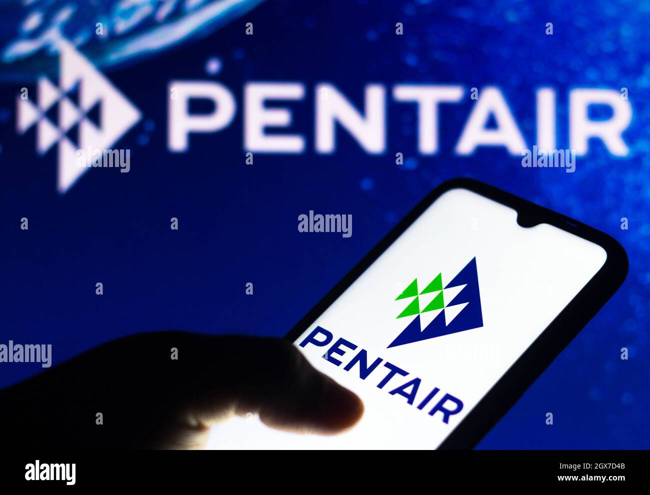 In this photo illustration the Pentair logo seen displayed on a ...