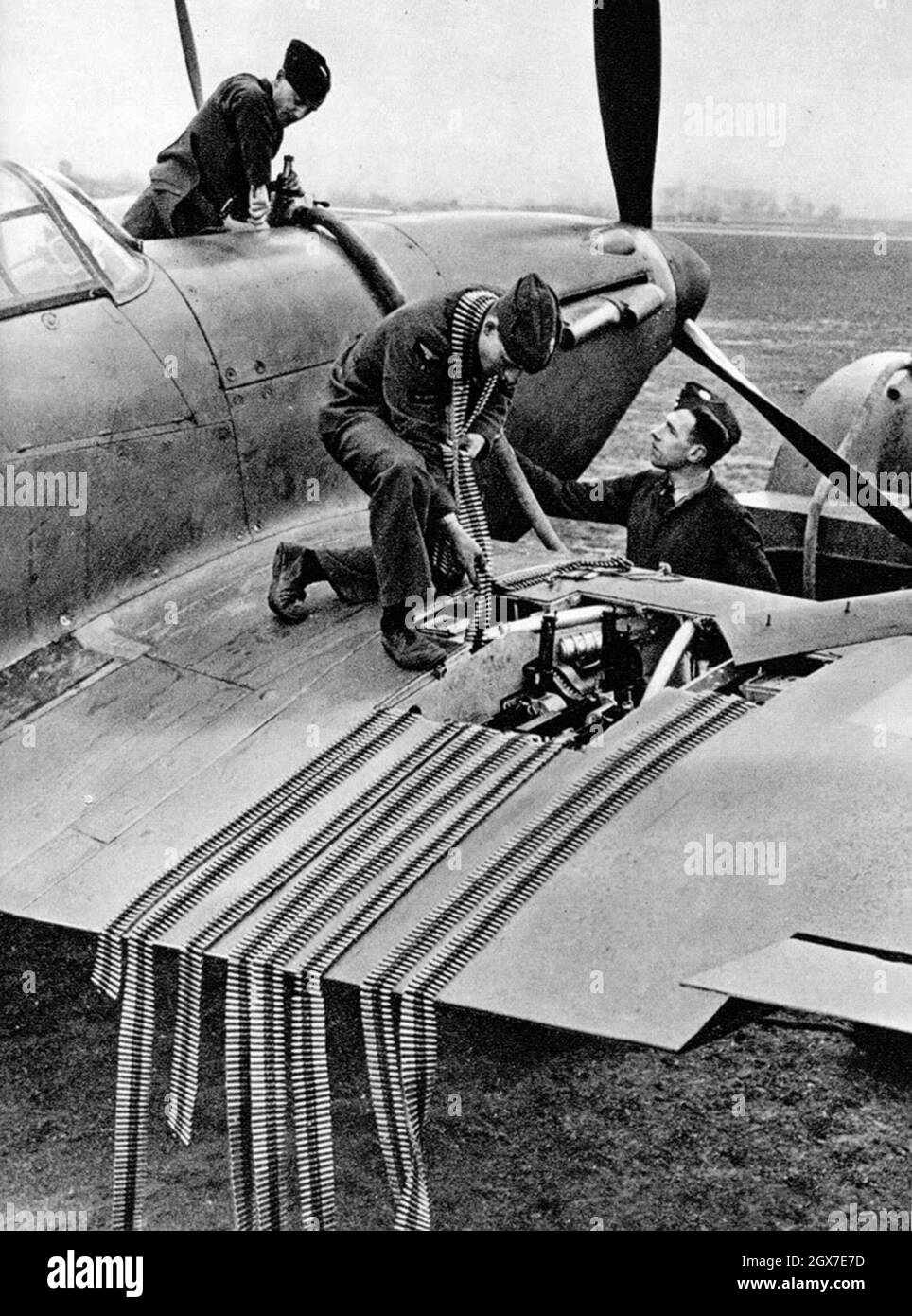 Ground crew re-arming a Spitfire during The Battle of Britain in 1940 ...
