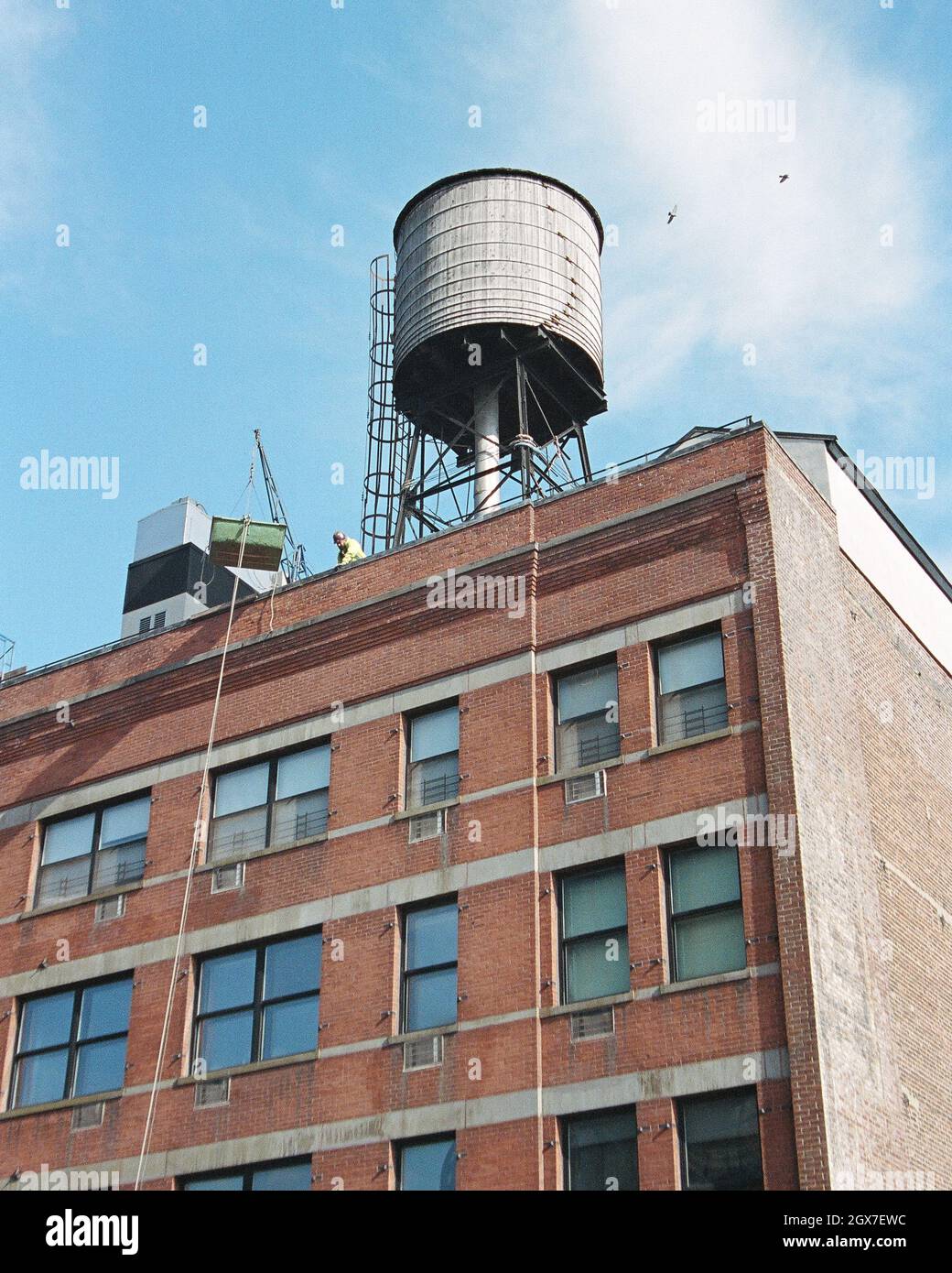 Water tower on top of a building in Chelsea, Manhattan, New York City ...