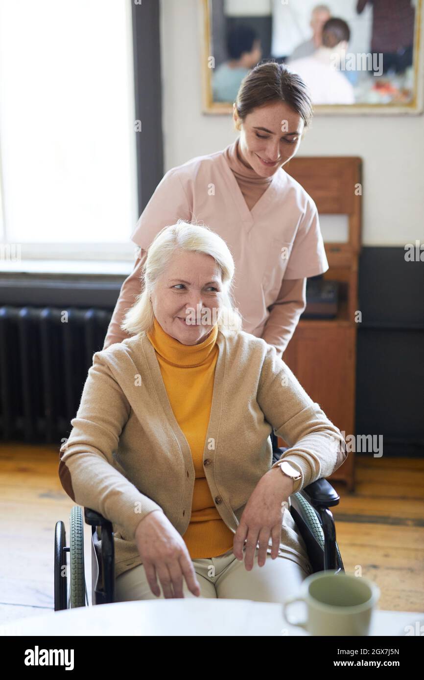 Caring nurse vertical hi-res stock photography and images - Alamy