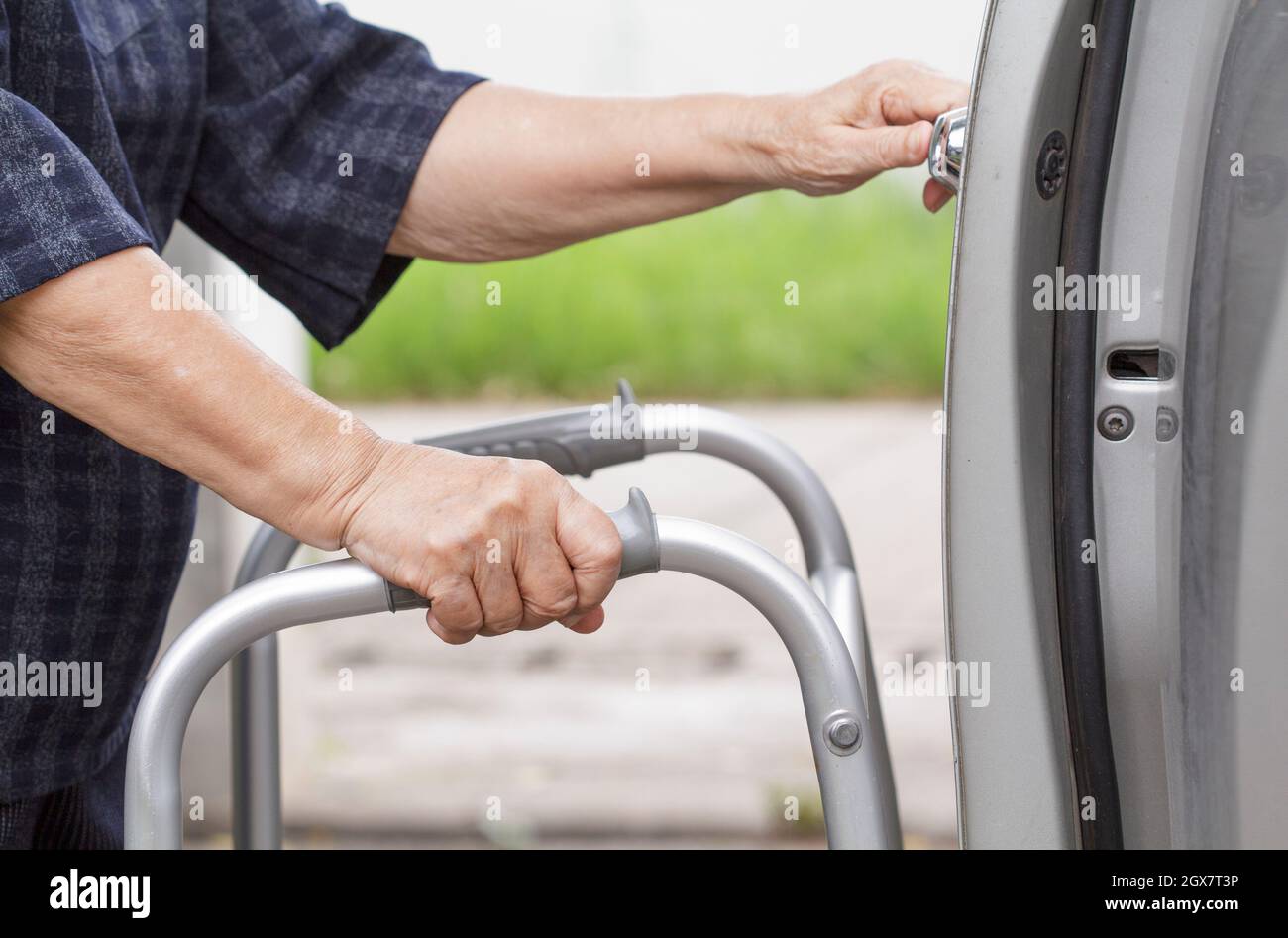 Senior elderly woman walker cane hi-res stock photography and images ...