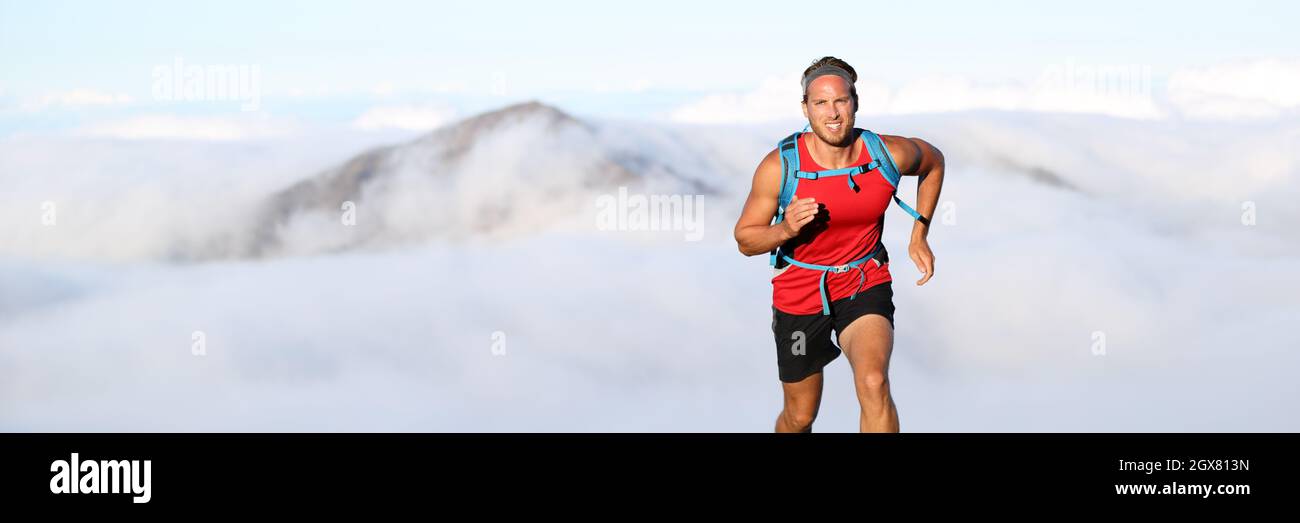 Trail runner man athlete running in mountains outdoor nature with ...