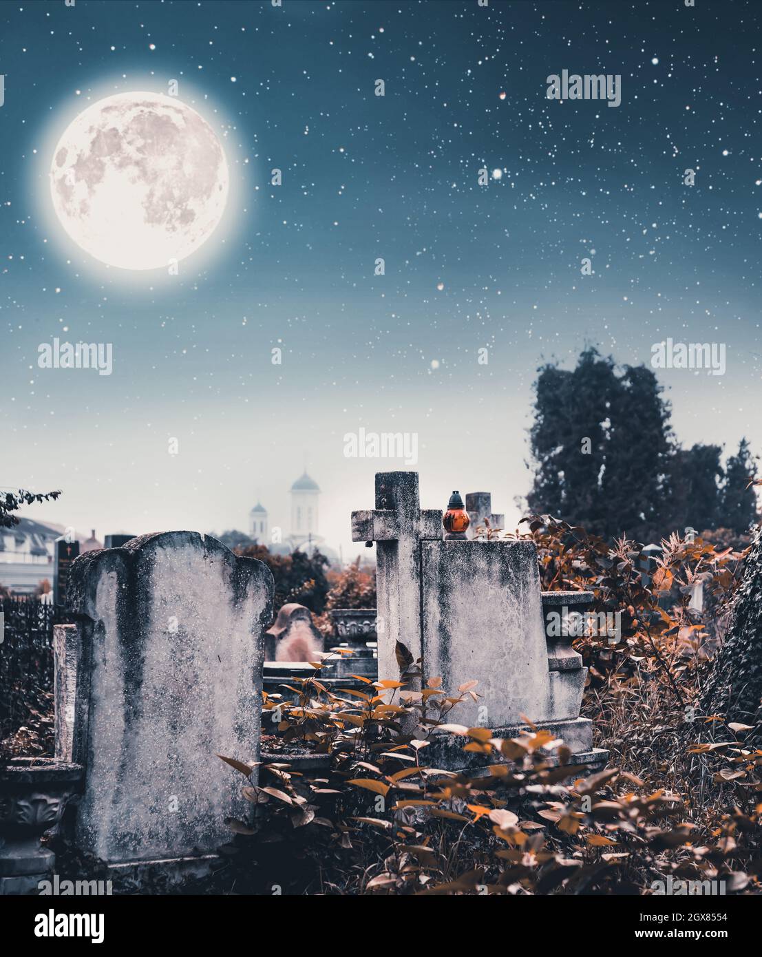 Tombstones in cemetery at night with full moon. Halloween concept Stock ...