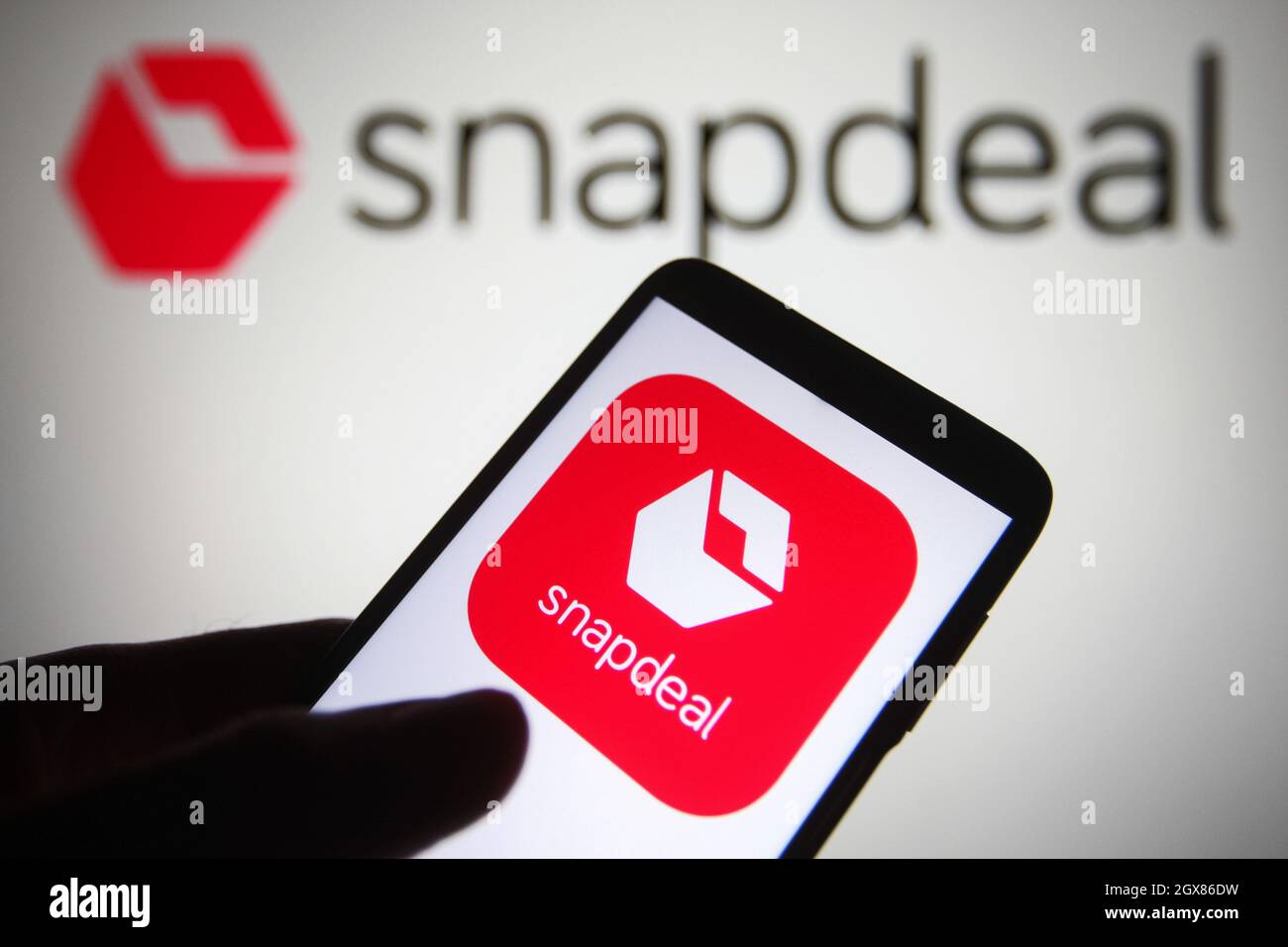 In this photo illustration a Snapdeal logo is seen on a smartphone and ...