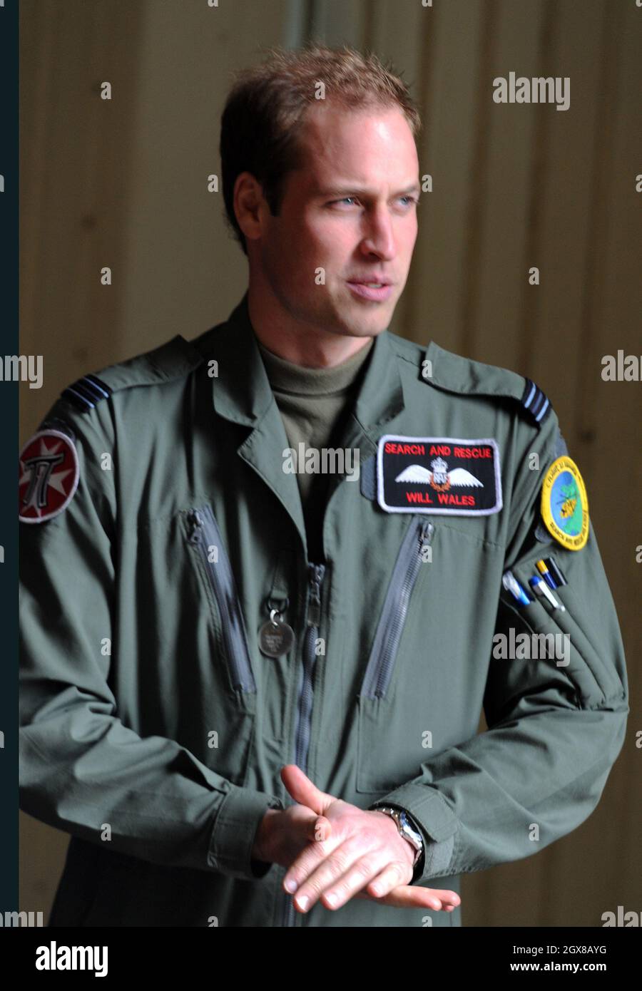 Prince William waits to meet Queen Elizabeth ll as she visits RAF ...