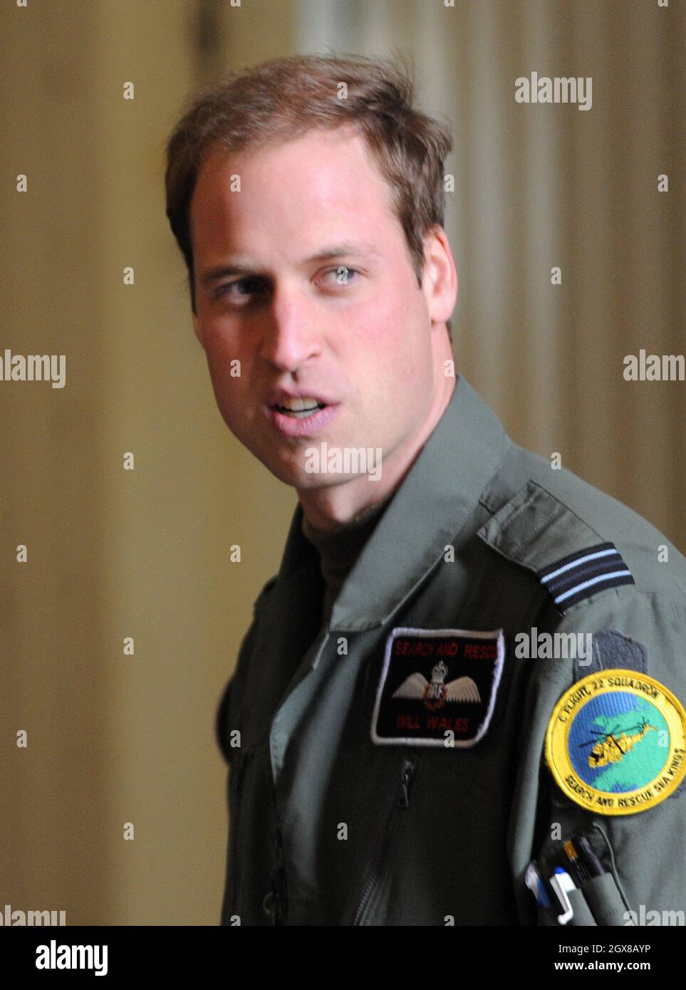Prince William waits to meet Queen Elizabeth ll as she visits RAF ...
