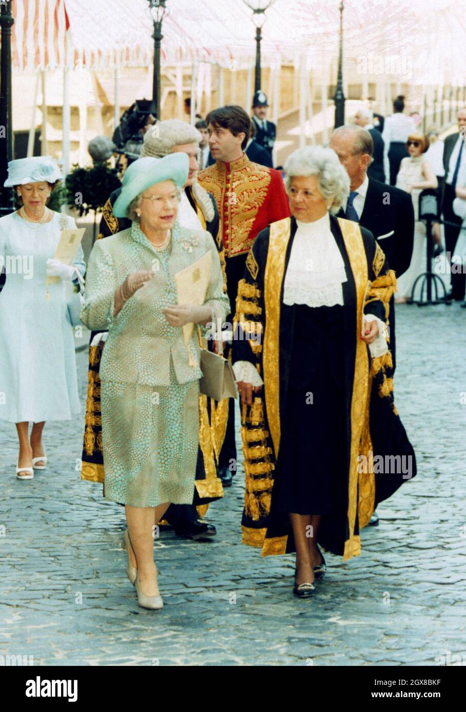 Queen Elizabeth II arrives at the House of Commons in London to ...