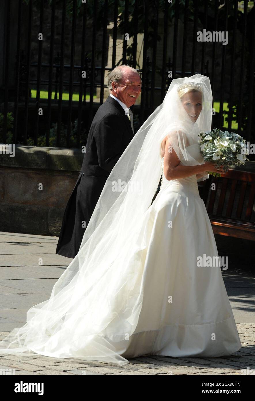 Zara Phillips, accompanied by her father Captain Mark Phillips. arrives ...