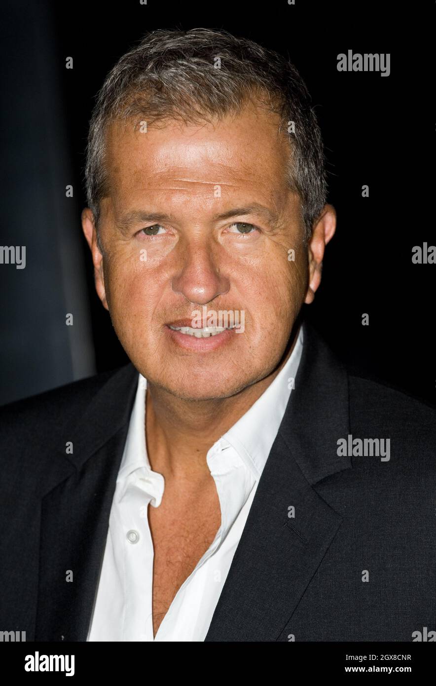 Photographer Mario Testino attends the Wool Modern Exhibition opening ...