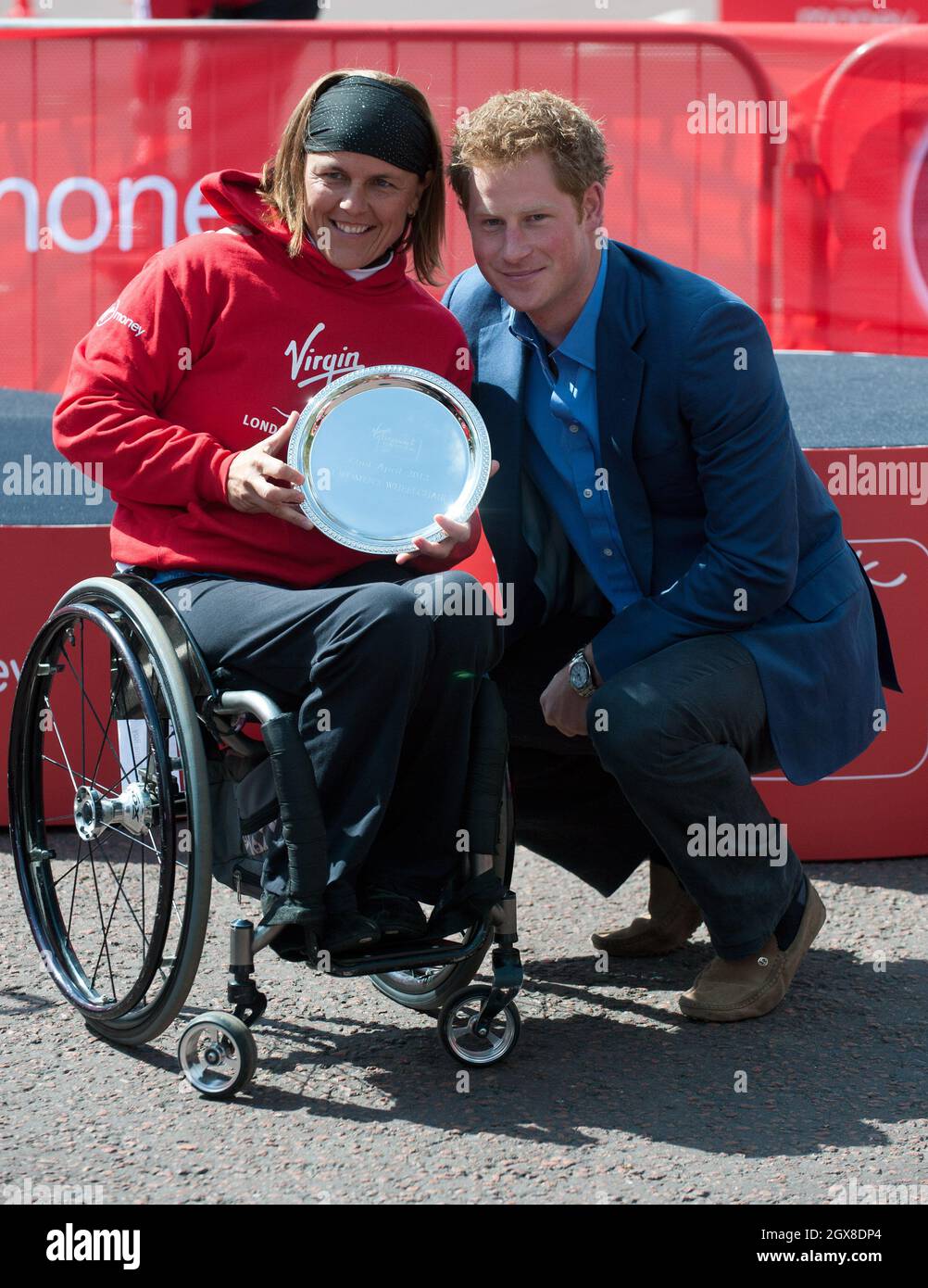 Prince Harry poses with Diane Roy from Canada, who came third in the ...