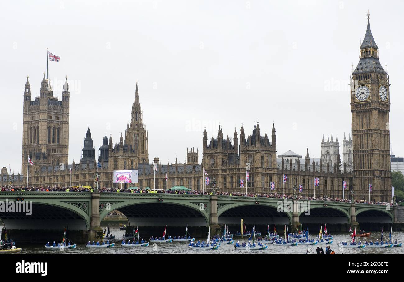 The flotilla of boats pass Big Ben and the Houses of Parliament during ...