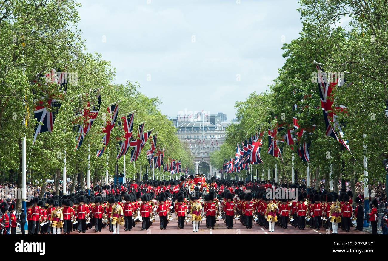 Soldiers march up the Mall following the Trooping the Colour Ceremony ...