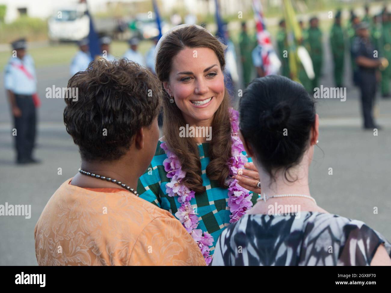 Catherine, Duchess of Cambridge, wearing a traditional garland, arrives ...