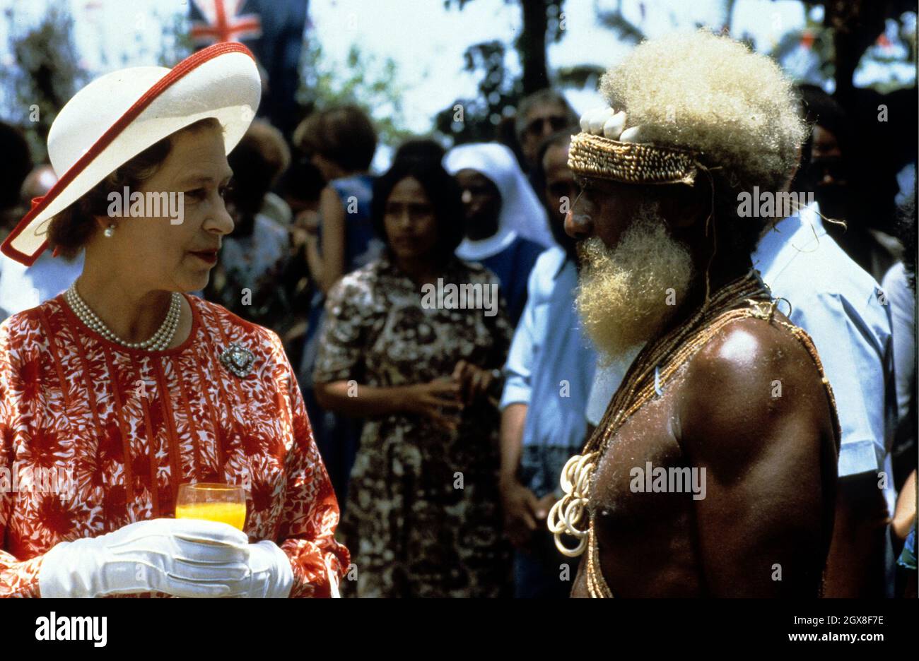 Queen Elizabeth ll chats with a native in the Solomon Islands during ...